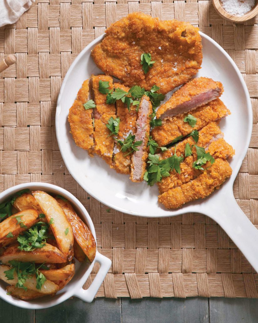 Budget-friendly beef schnitzel with potato wedges - MyKitchen